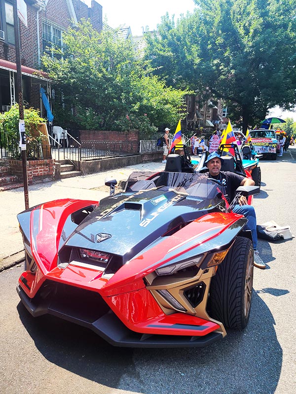 Dr Adal in Slingshot car by Miggz Exotic Rides | World Liberty TV ...